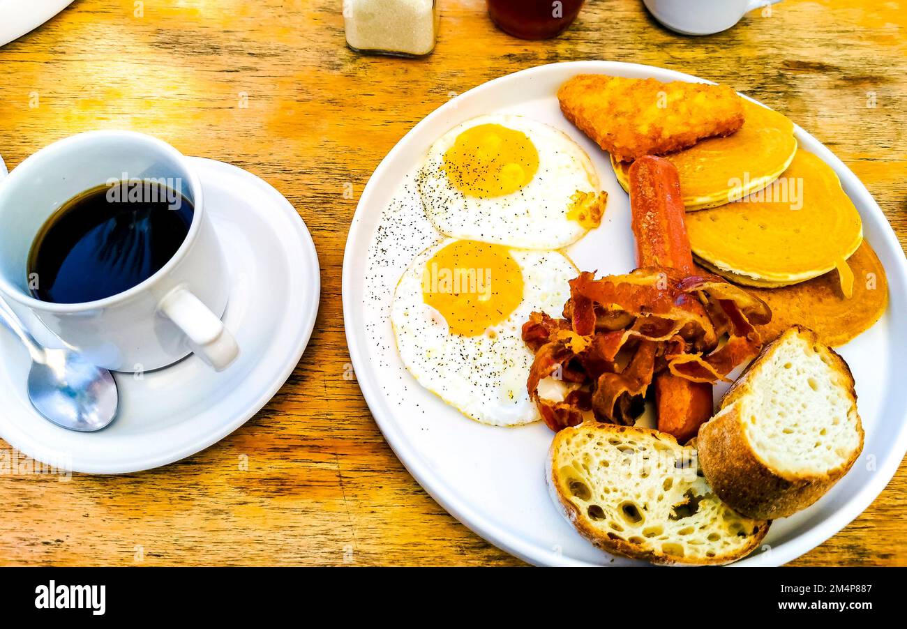 Intercontinental breakfast with sausages eggs and coffee on Isla Holbox ...