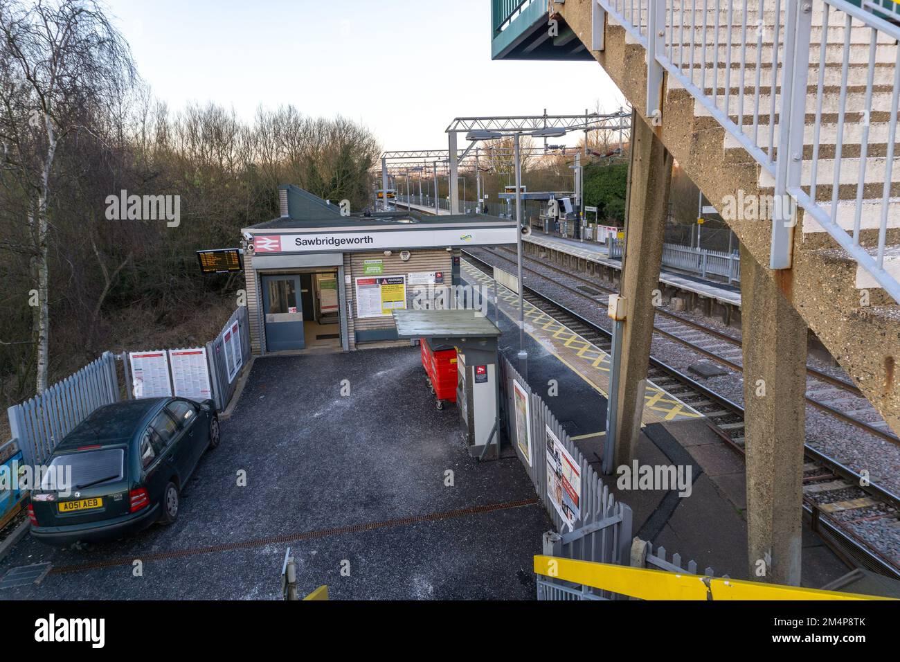 The ticket office and railway track plus concrete footbridge in ...