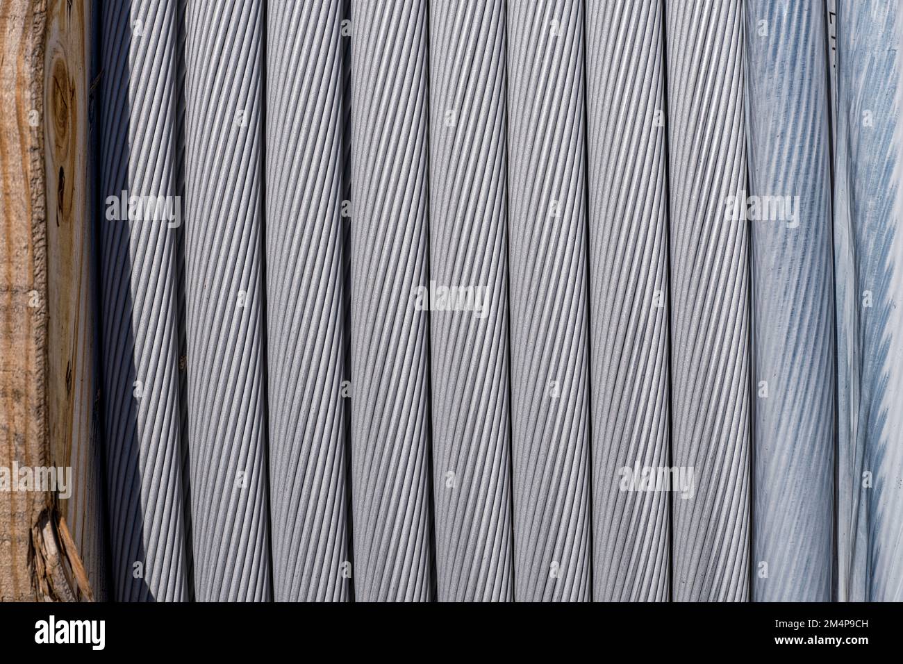 Section of a spool of high voltage electrical cable Stock Photo - Alamy