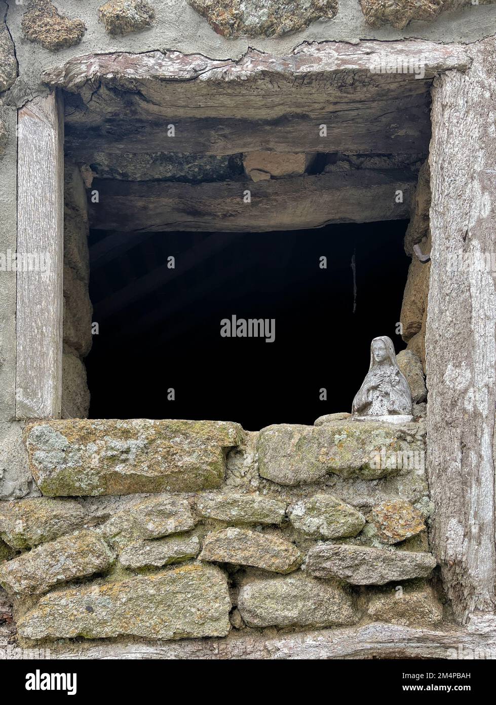 shrine in a wall in Moncontour Stock Photo - Alamy