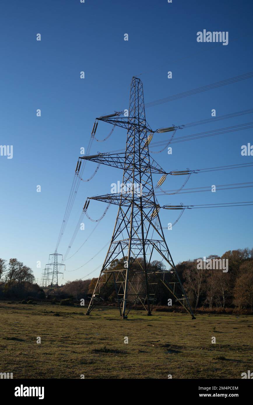 Electricity pylons or Lattice Towers situated in the countryside of ...