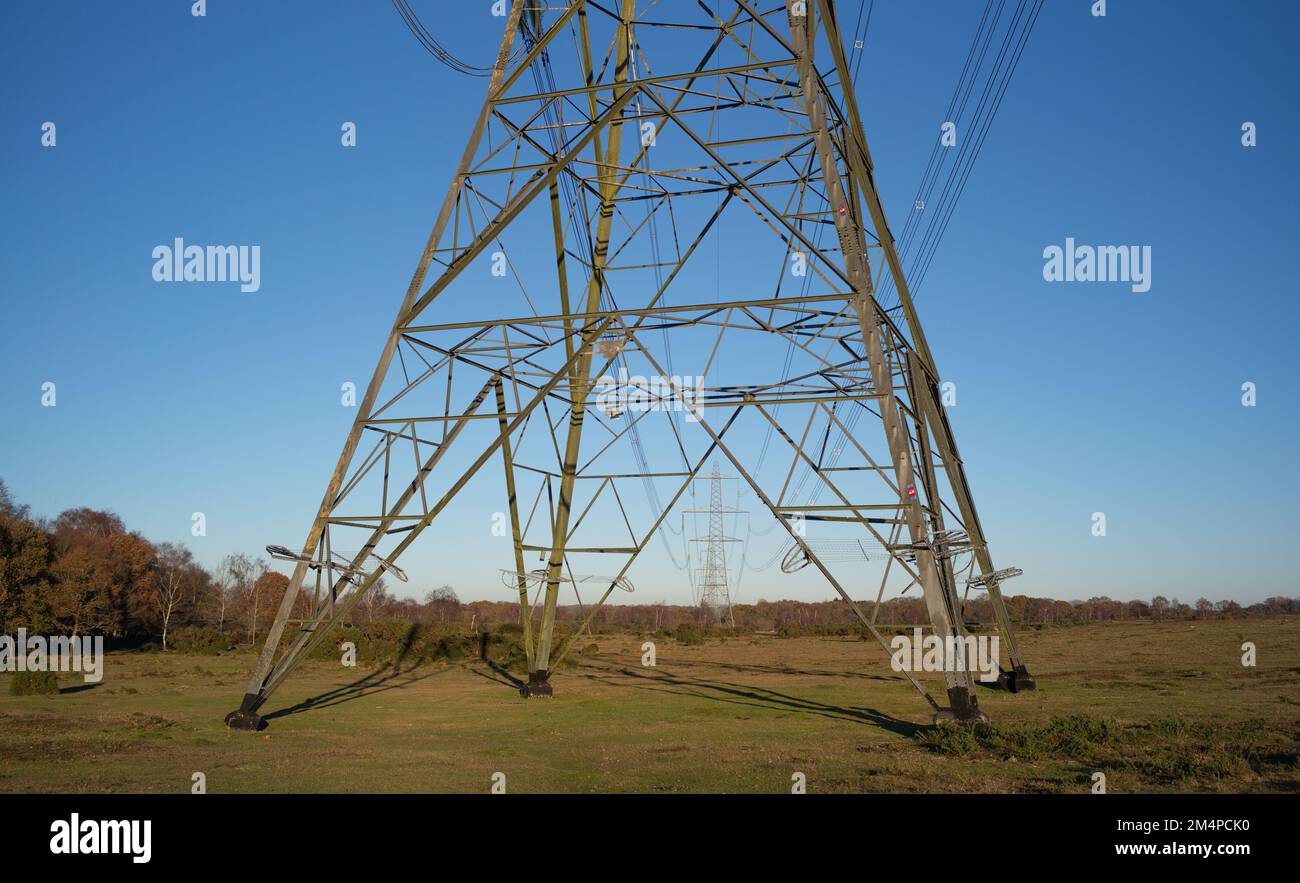 Electricity pylons or Lattice Towers situated in the countryside of ...