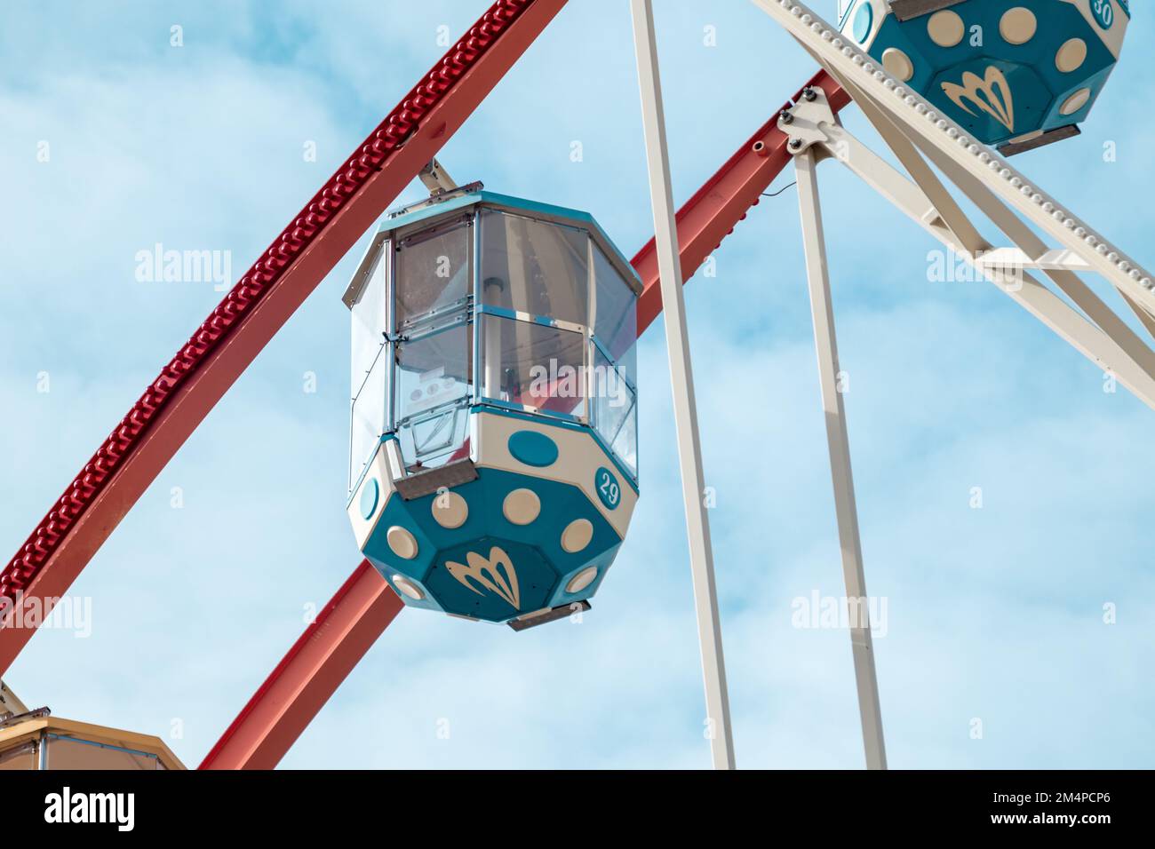 Blue ferris wheel cabin close view on blue sky. Culture and recreation ...