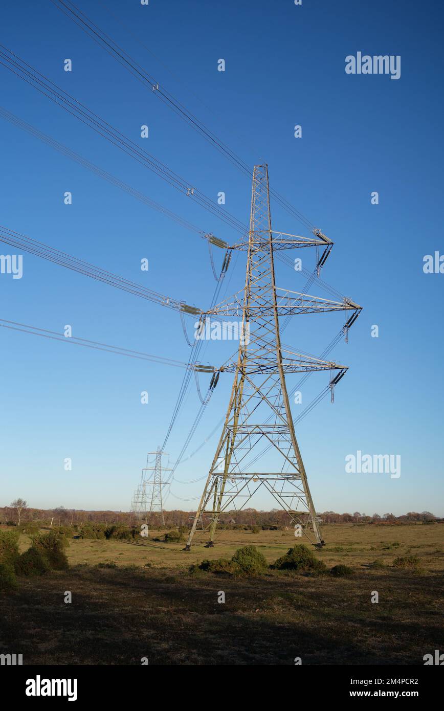 Electricity pylons or Lattice Towers situated in the countryside of ...