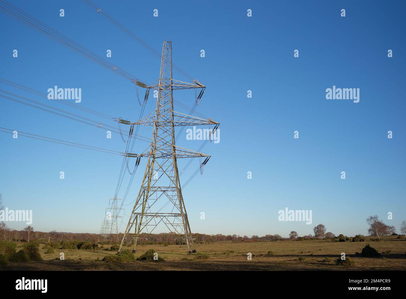 Electricity pylons or Lattice Towers situated in the countryside of ...