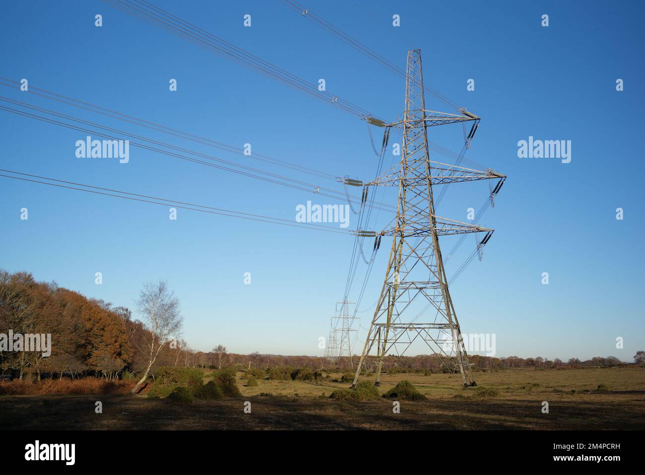 Electricity pylons or Lattice Towers situated in the countryside of ...