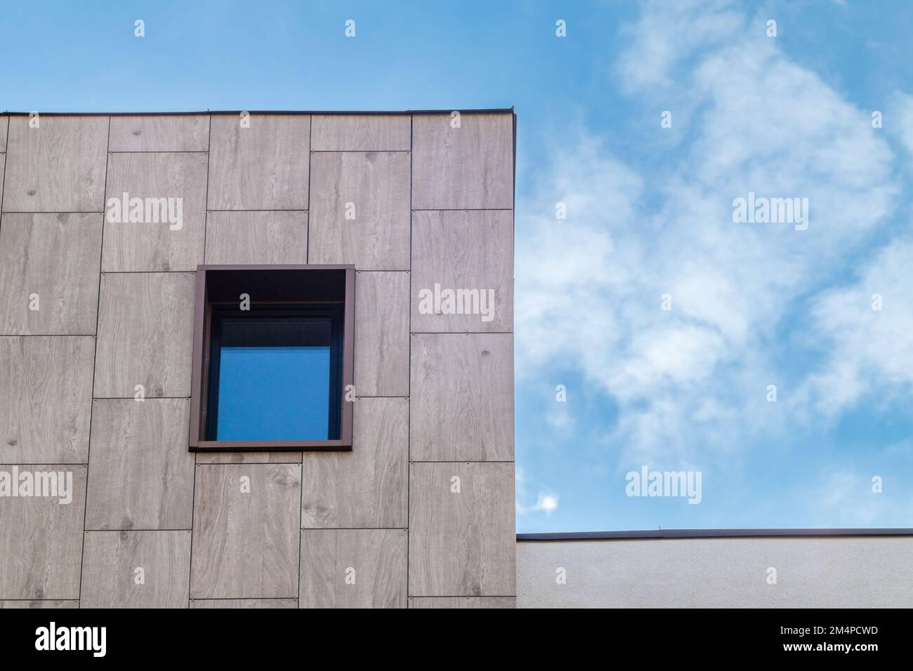 Modern residential building facade architecture details. Tiled wall ...