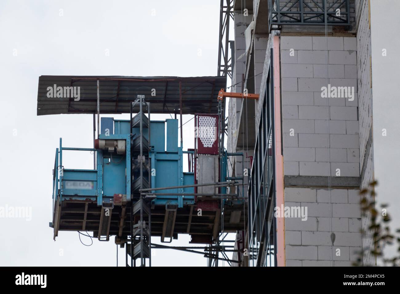 Multistory white brick building construction site close-up details ...
