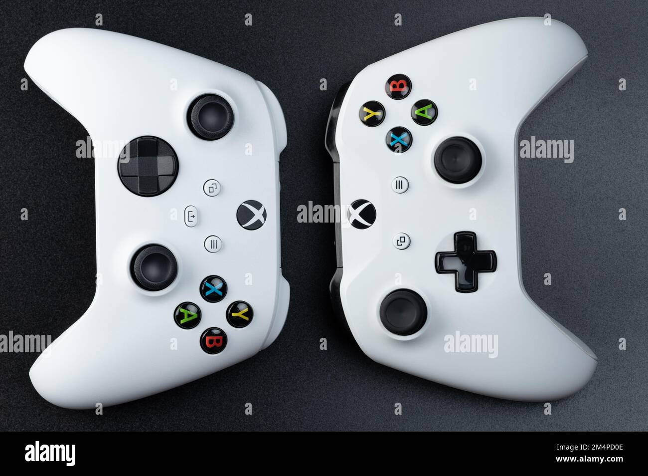 New york, USA - December 21, 2022: Two white xbox controller different ...