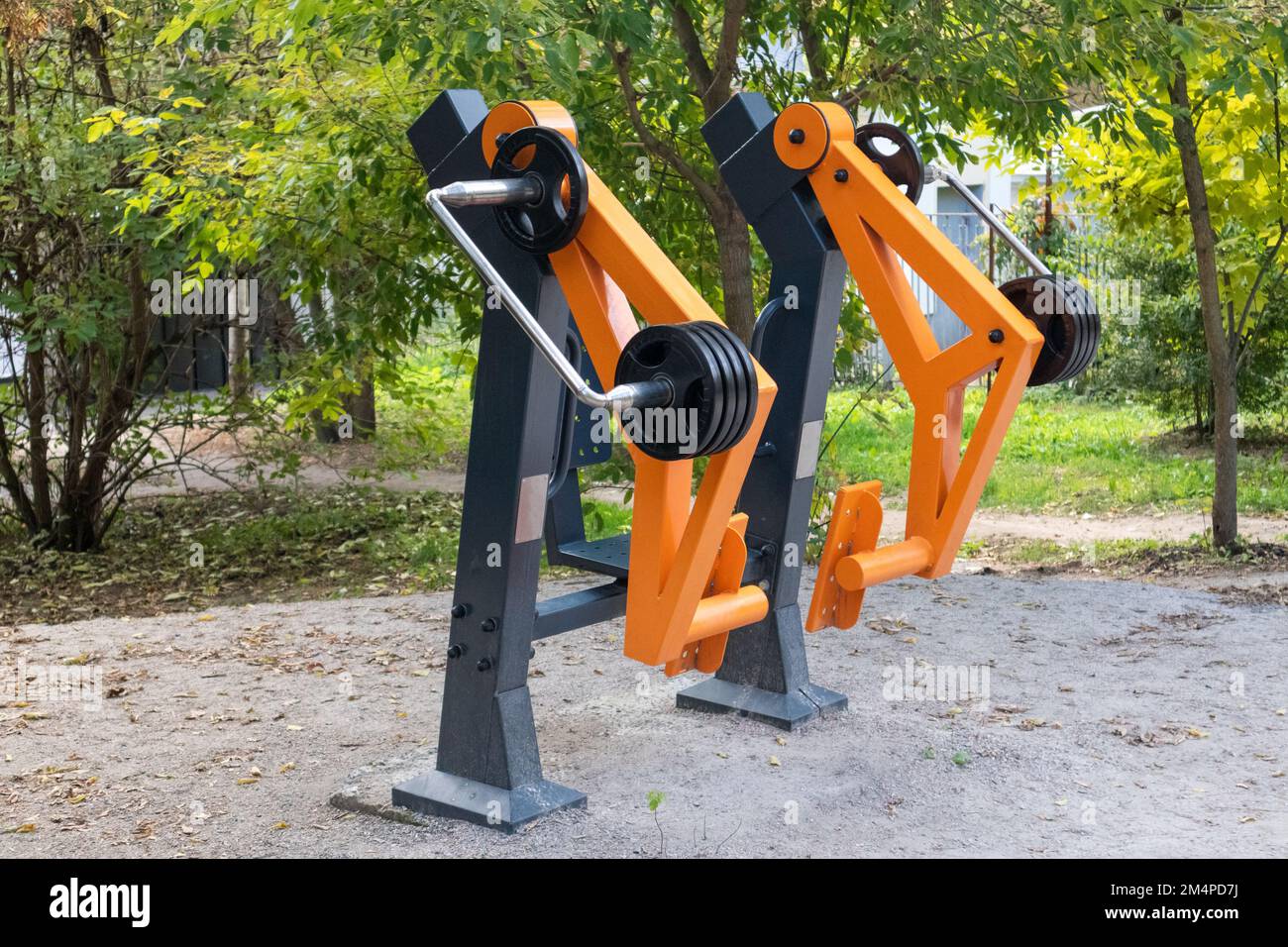 Outdoor sports ground with weight training equipment in city park ...