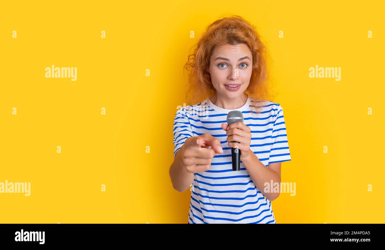 music concept. woman singer isolated on yellow background. woman singer ...