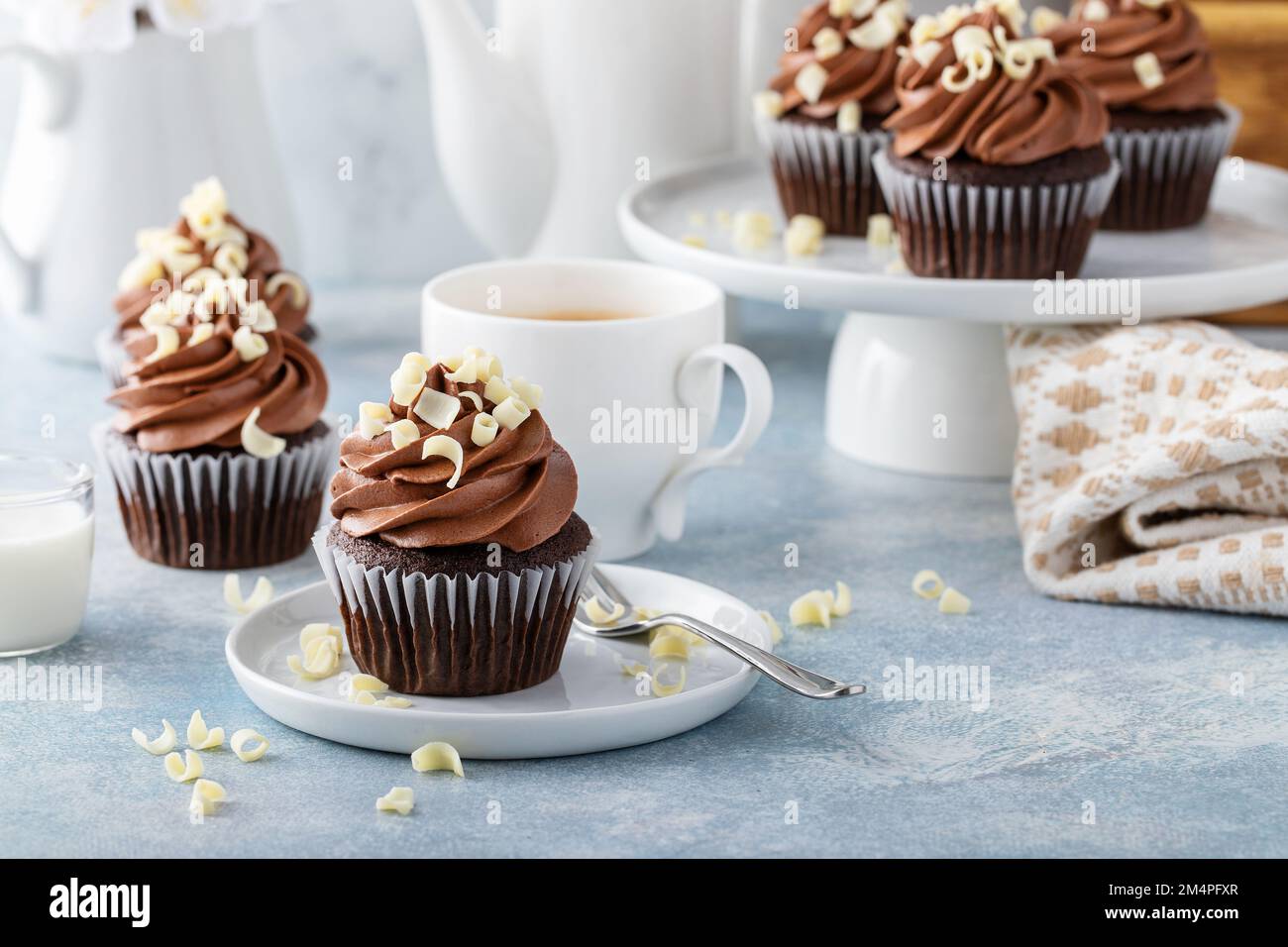 Chocolate cupcakes with sweet chocolate ganashe frosting Stock Photo ...