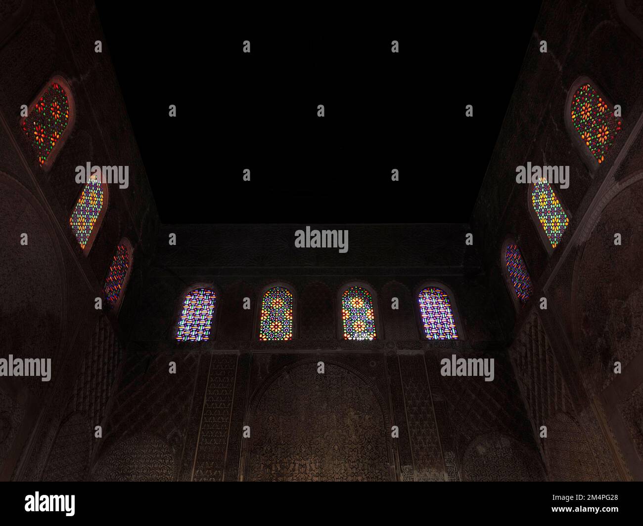 Colourful mosaic windows in the dark, ornaments, interior view, 14th ...