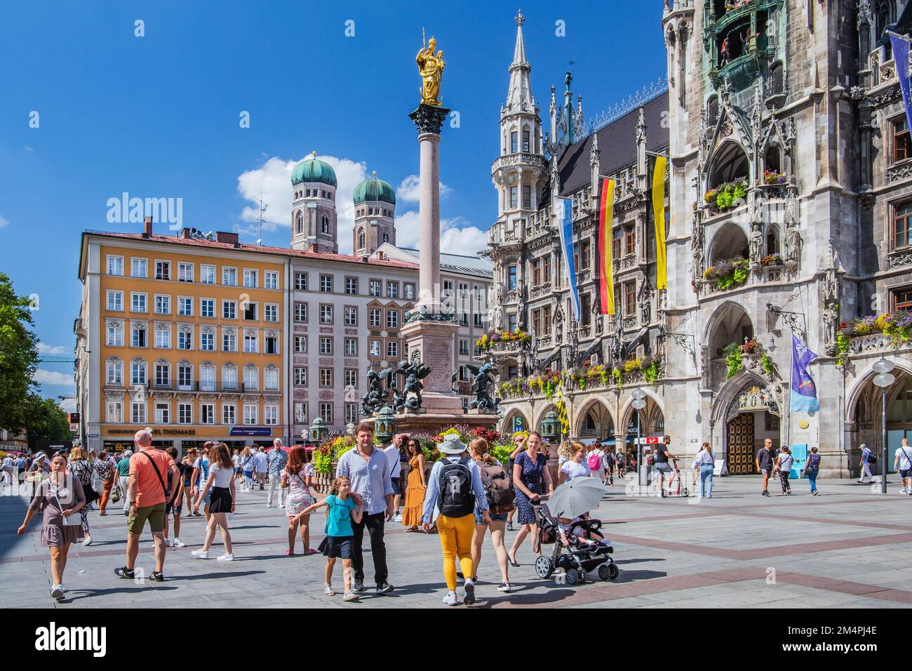 Marienplatz with Mariensaeule, City Hall and towers of the Church of ...