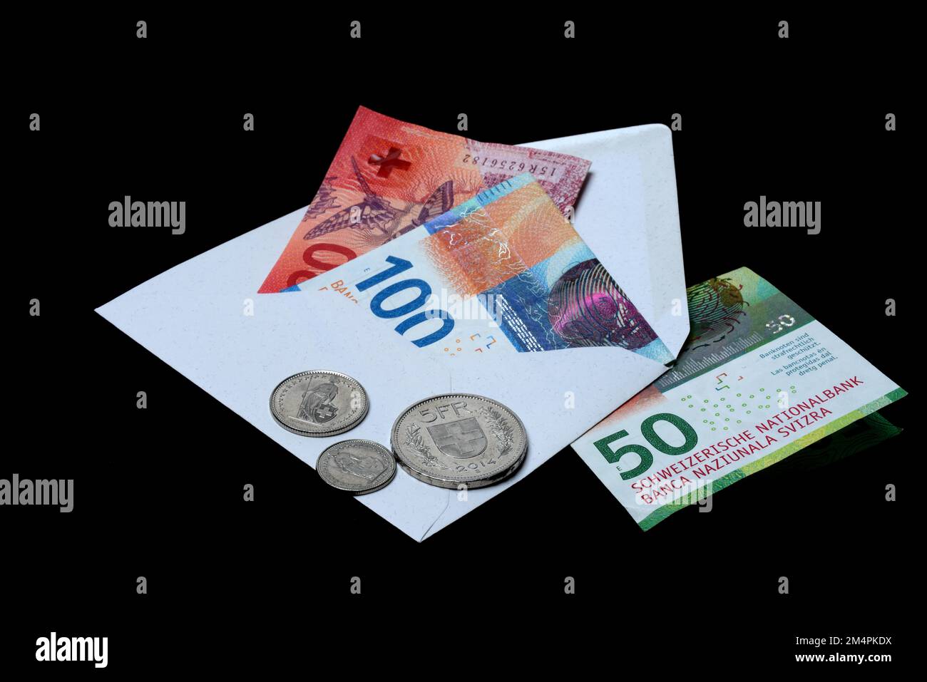 Swiss banknotes and coins with envelope, money gift, symbol photo Stock ...