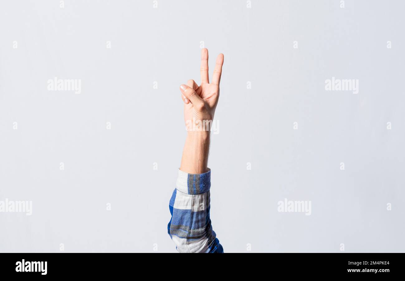 Counting the number TWO in sign language. Deaf and dumb counting the ...