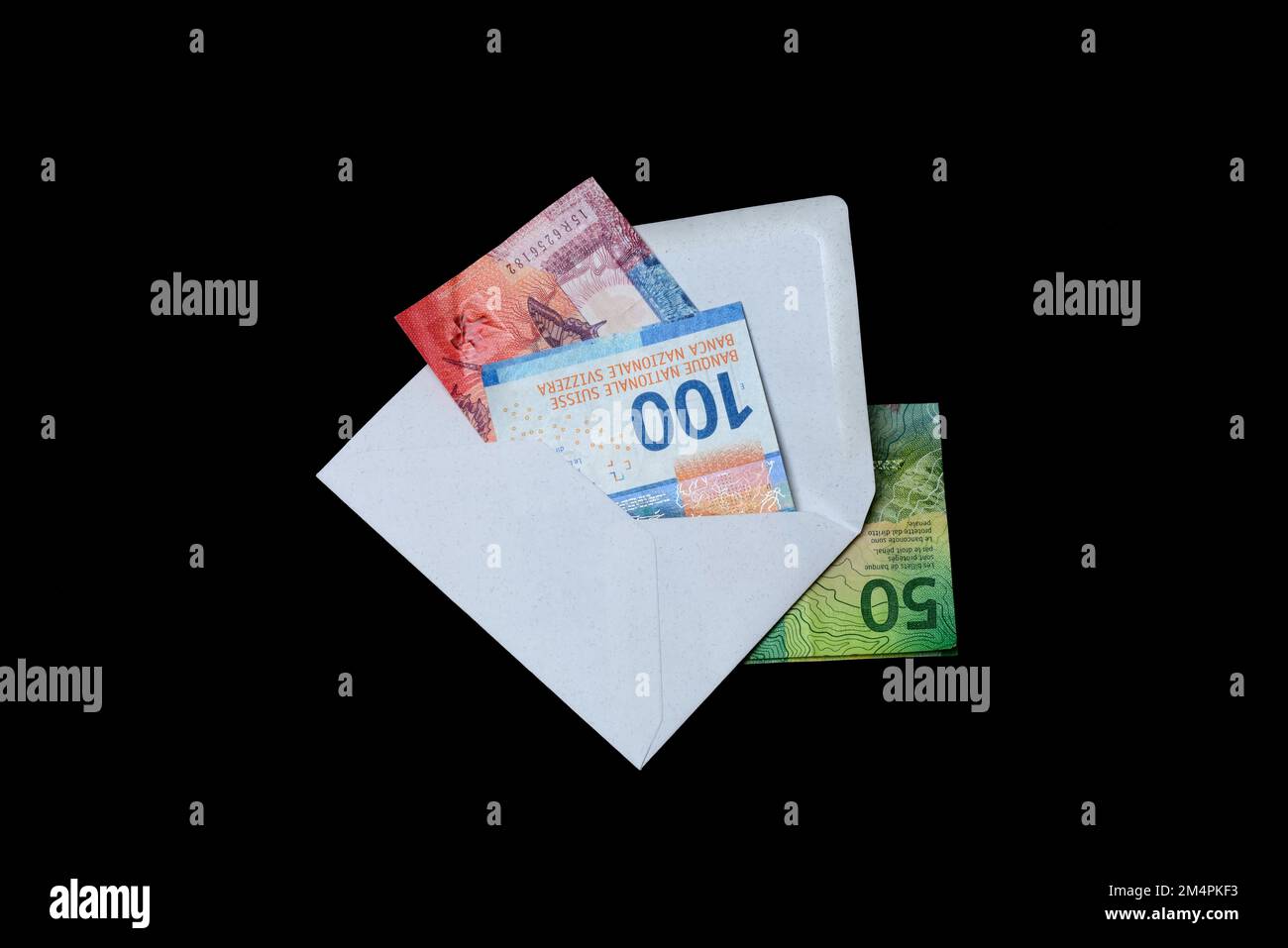 Swiss banknotes with envelope, money gift, symbol photo Stock Photo - Alamy