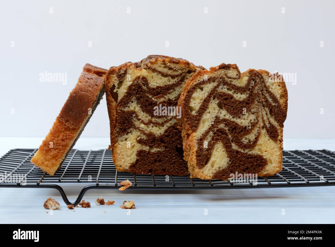 Marble cake on cake rack Stock Photo - Alamy