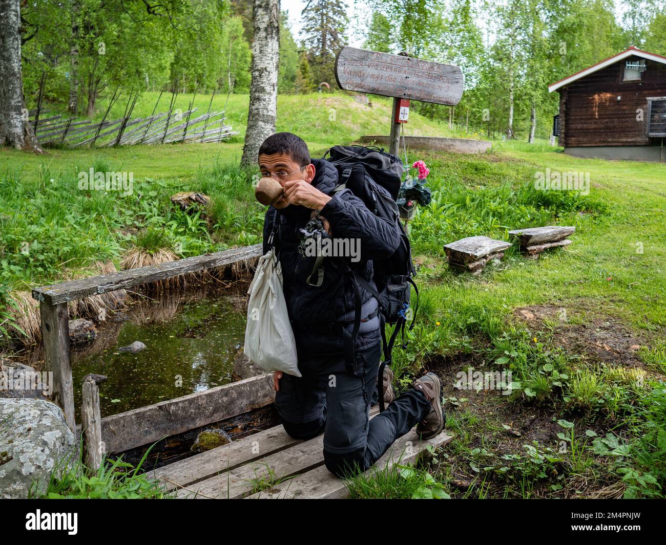 A pilgrim seen drinking water from one of these springs which are often ...