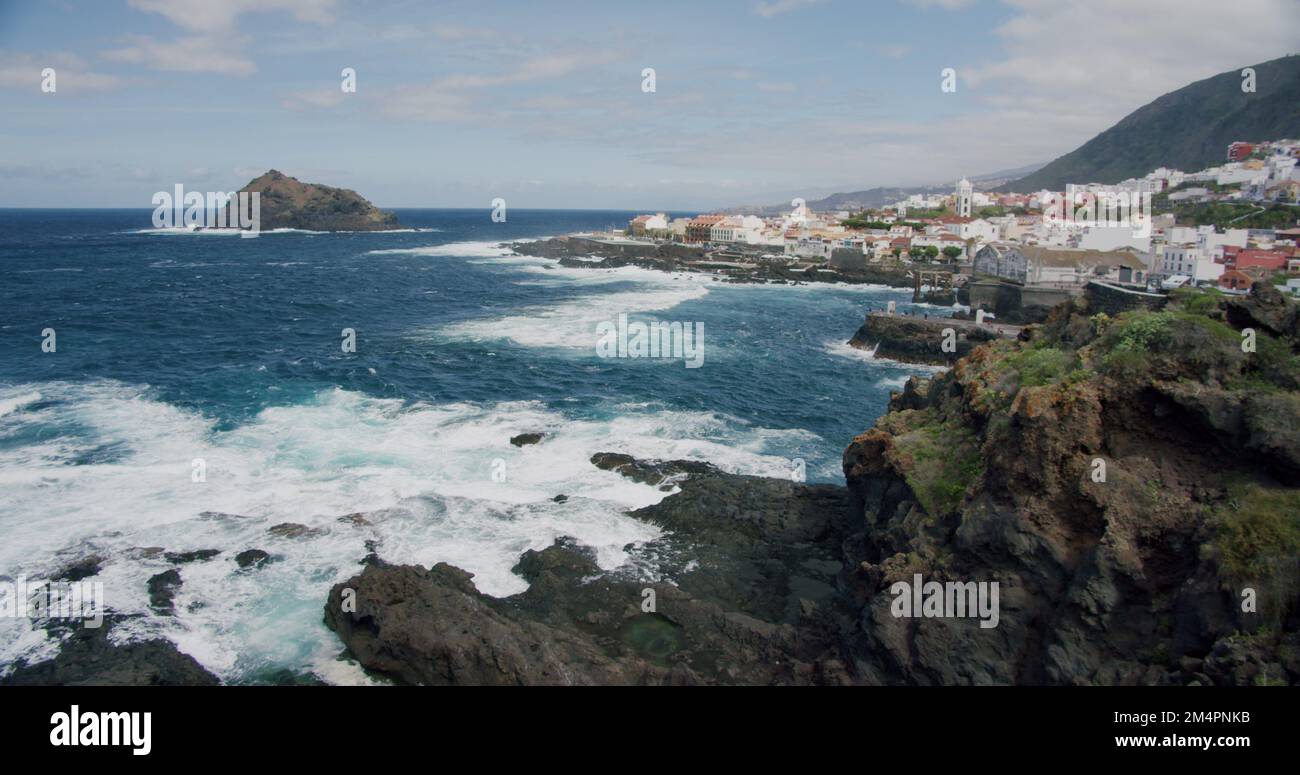Waterfront of beautiful Garachico town and volcanic shore. Tenerife ...