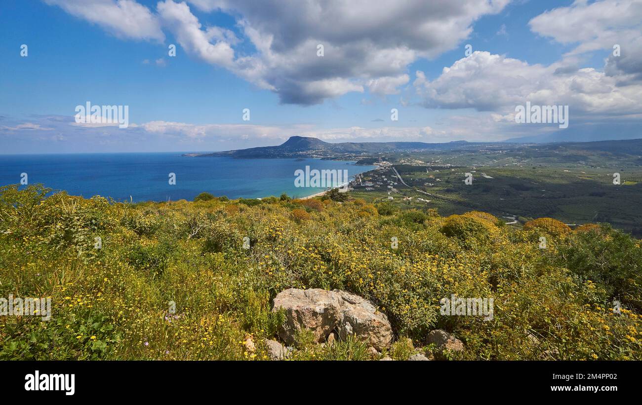Spring meadow, Drapanon peninsula, blue sky, grey-white clouds, green ...