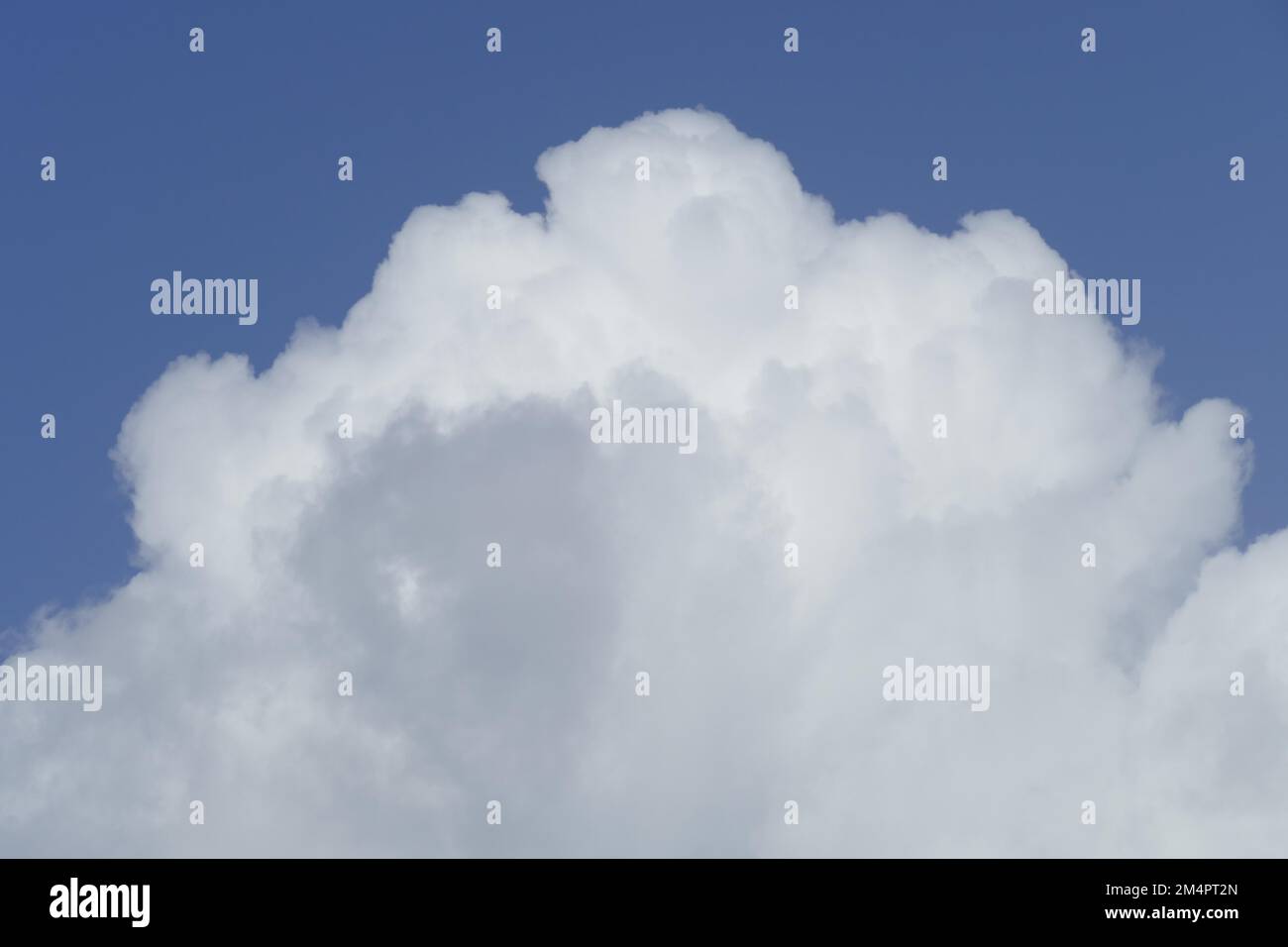 White spring clouds, blue sky, Germany Stock Photo - Alamy
