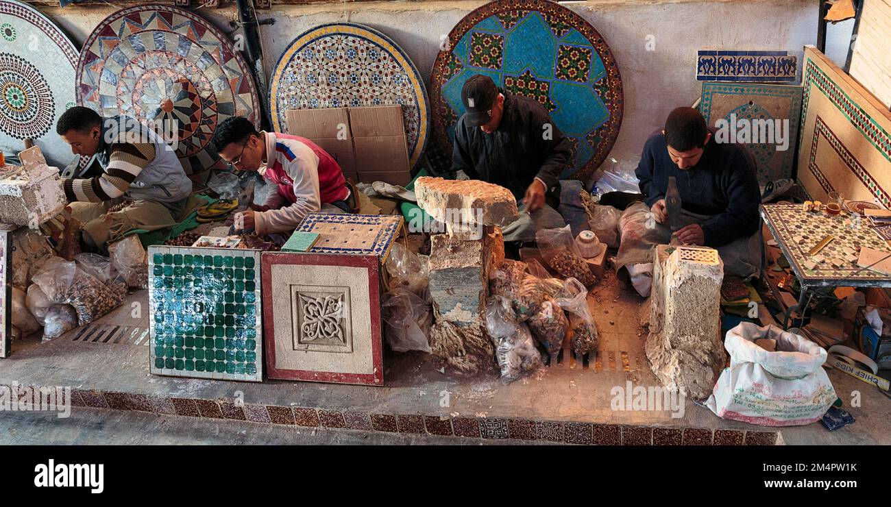 Making tiles with traditional ornaments, mosaics in a pottery, Fez, Fez ...