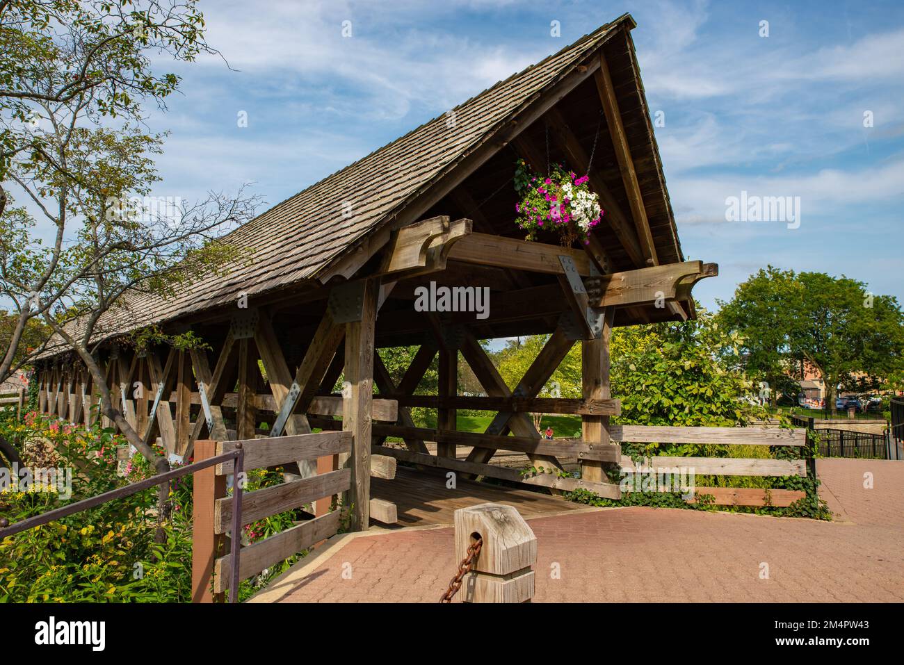 Wooden covered bridge in downtown Naperville on a beautiful sunny day ...