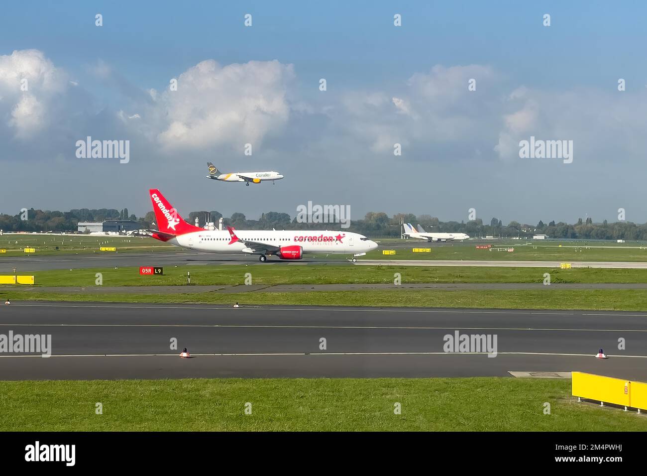 Two aircraft passenger jets jets jets jets in front Corendon Airlines ...
