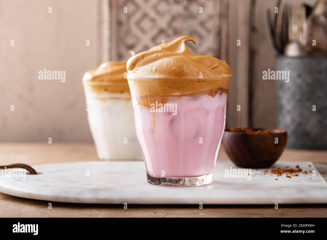 Strawberry dalgona whipped coffee in a glass with ice Stock Photo - Alamy