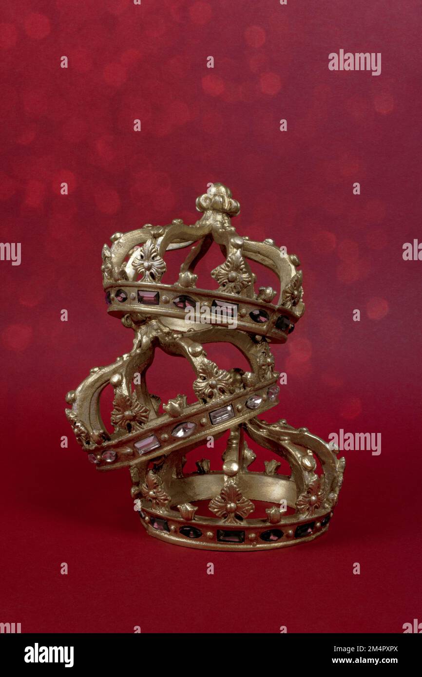Happy Three King's Day. Three gold crowns on red background. Concept ...