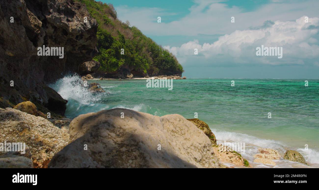 Water foams and spalshes ocean waves blue turquoise rushing to the ...