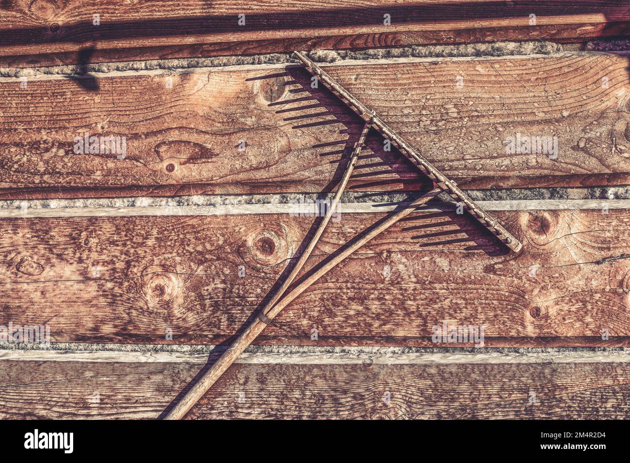 Old farm tools hanging on a wall hi-res stock photography and images ...