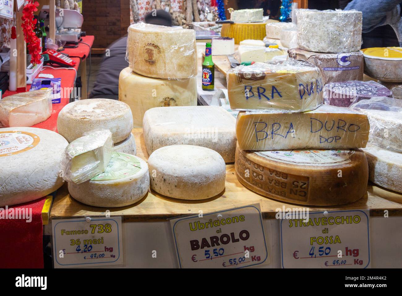 12-08-2022 Como , Italy. Solid cheese for 45 euro some variety in Como ...