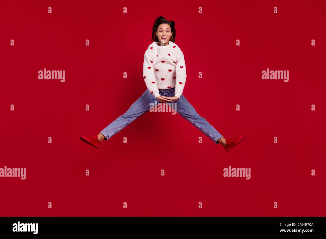 Full length photo of adorable cool lady wear white sweater jumping high ...