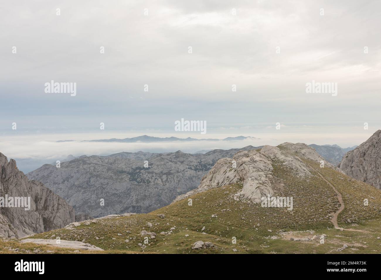 A breathtaking view of the rocky mountains in Naranjo de Bulnes ...