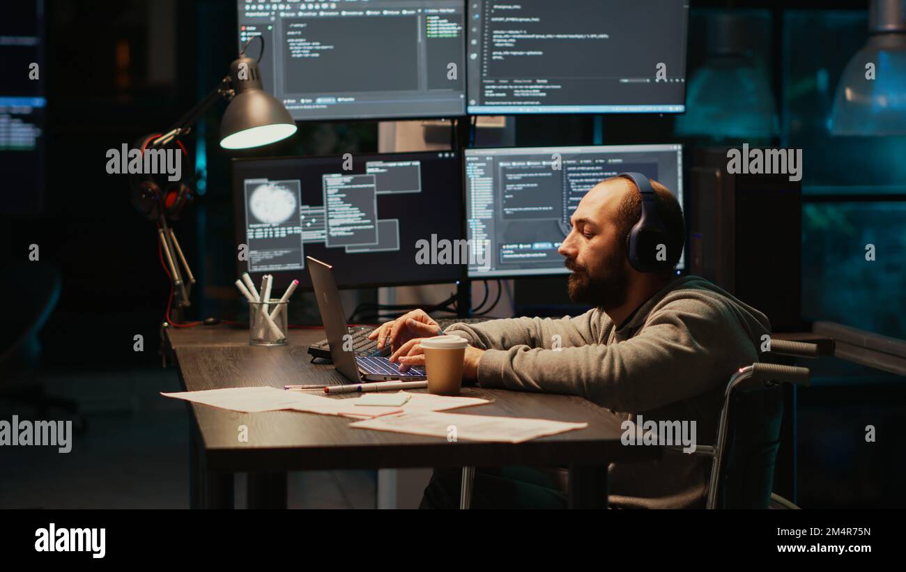 It Web Developer Writing Source Code In Office Dealing With Physical Disability At Night 