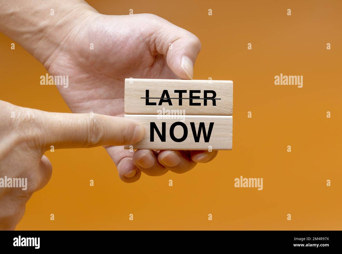 later and now, on the wooden block, the concept is to focus Stock Photo ...