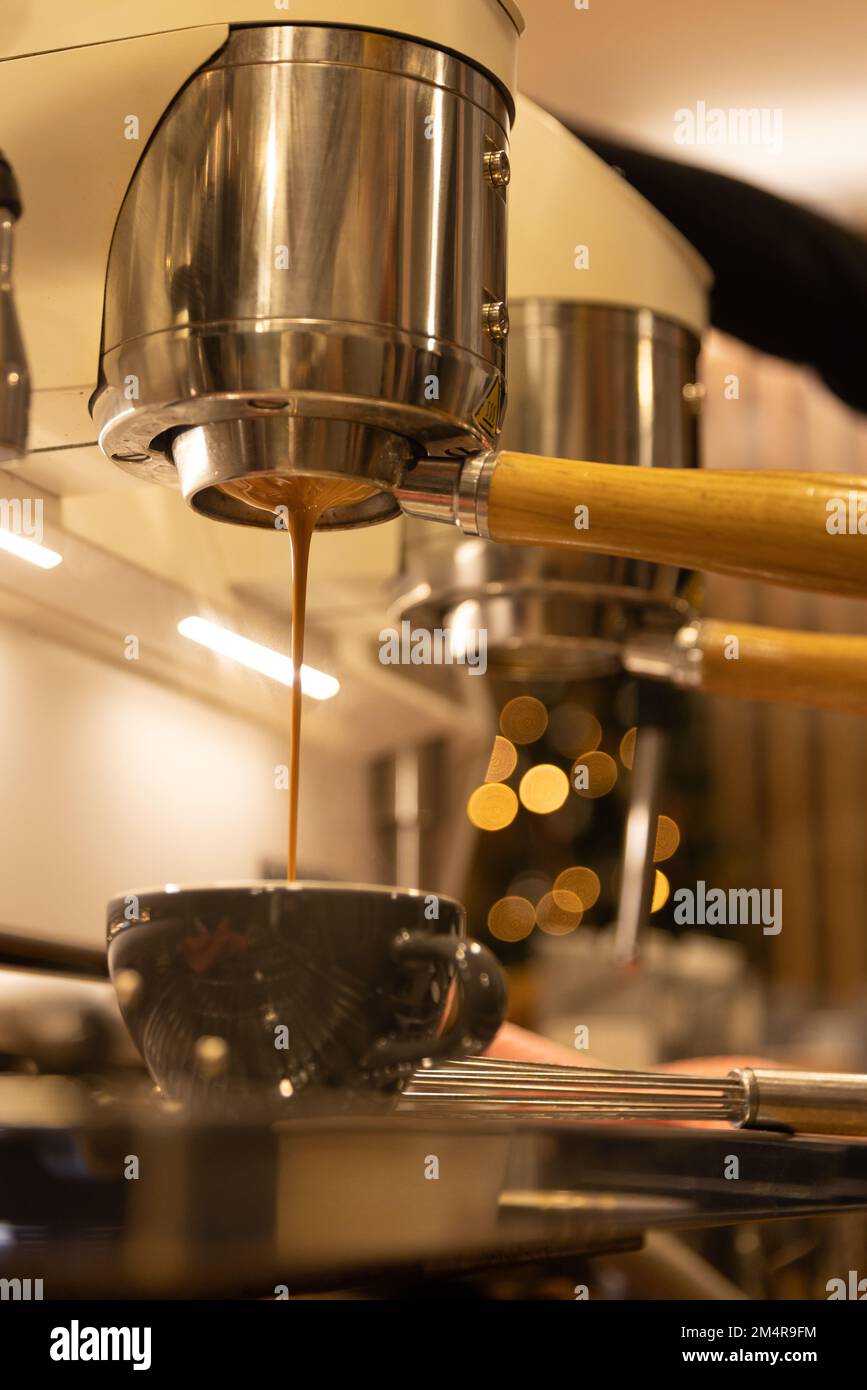 fresh espresso being pulled Stock Photo - Alamy