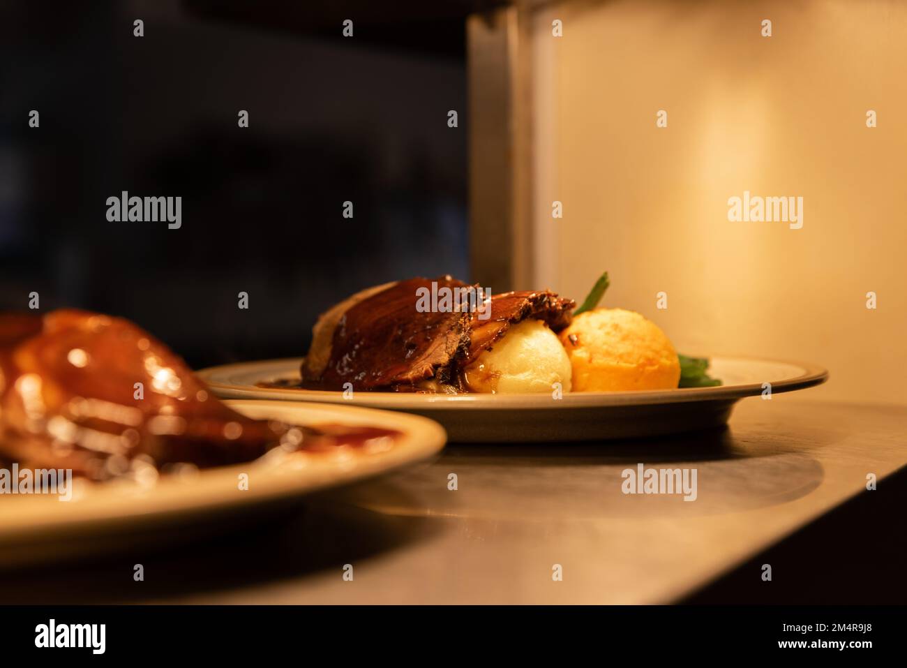 Irish Roast dinner plated up waiting for service Stock Photo - Alamy