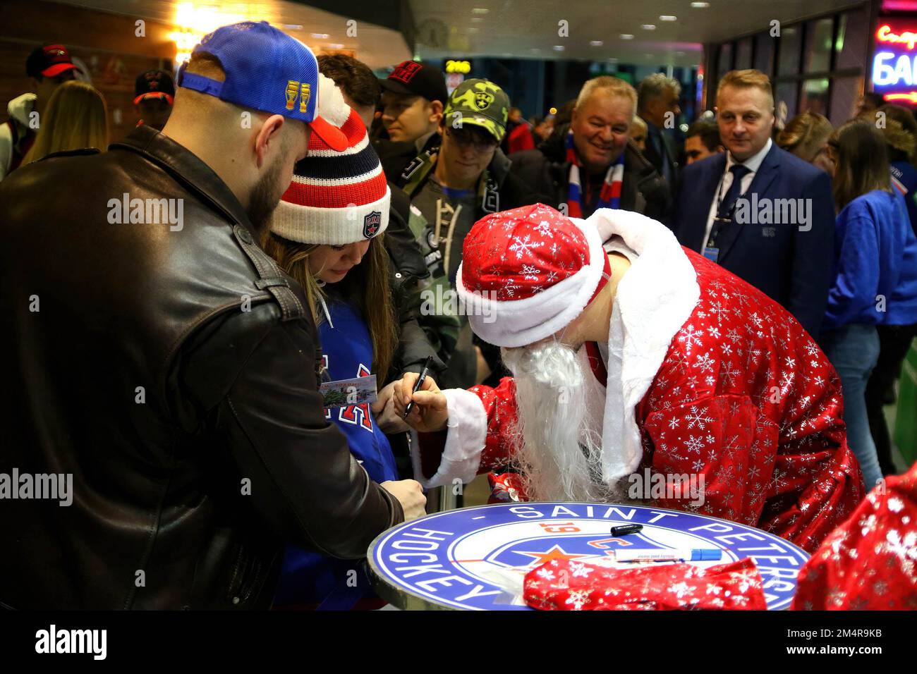 Santa Claus, known as father Christmas, signs autographs in honor of the New year and Christmas ...