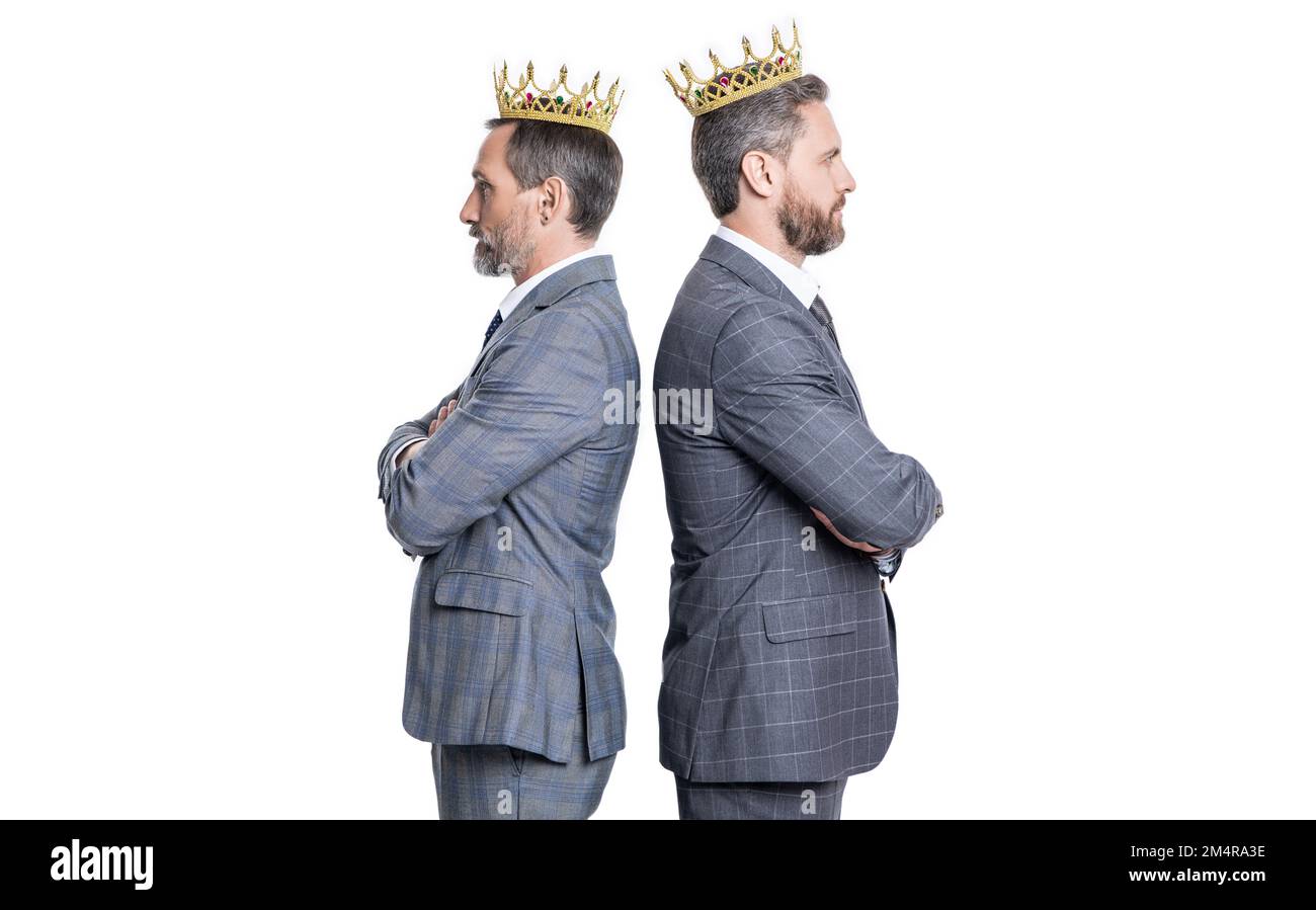successful businessmen in crown isolated on white studio background ...