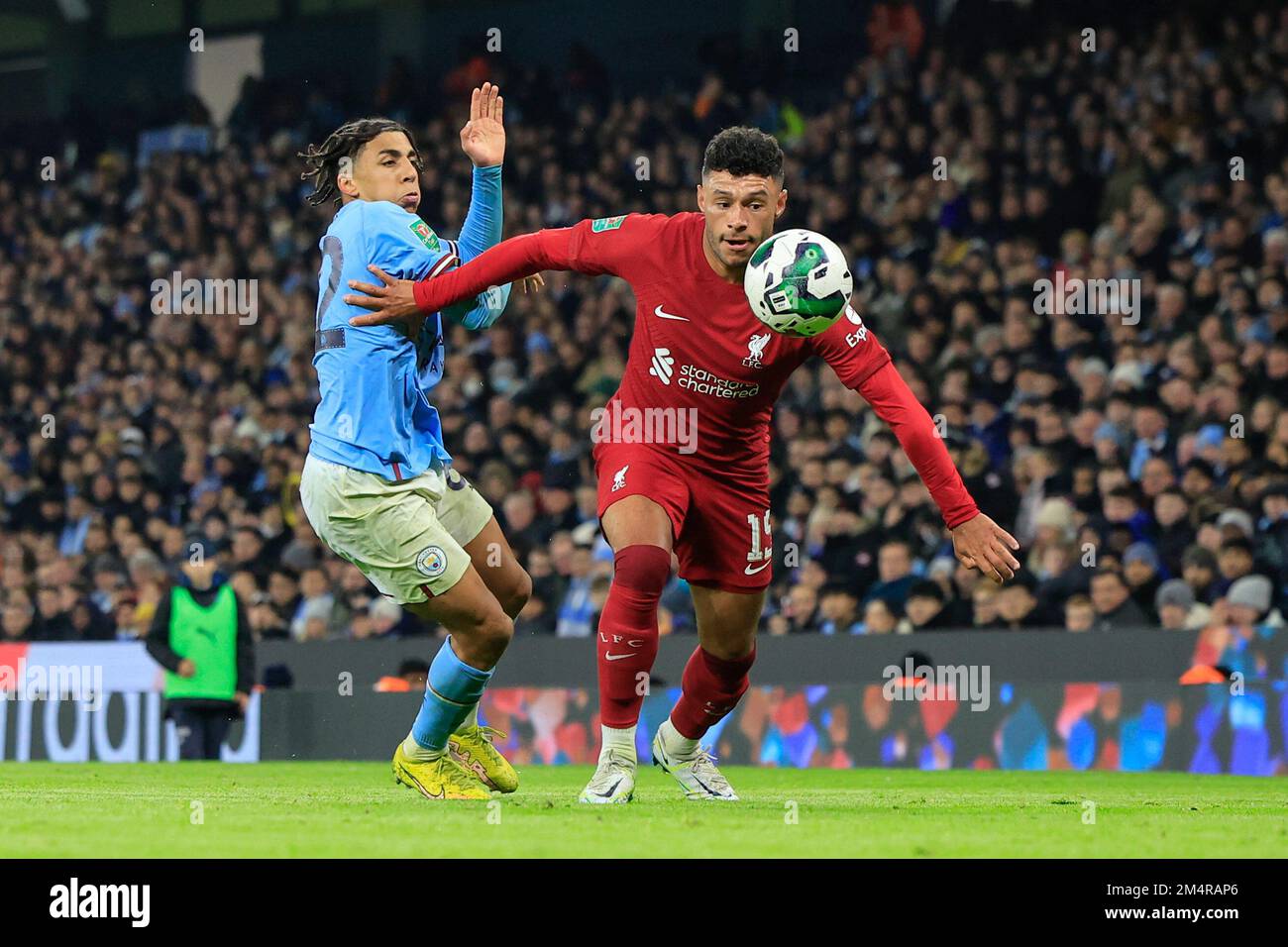 Alex Oxlade-Chamberlain #15 of Liverpool and Rico Lewis #82 of ...