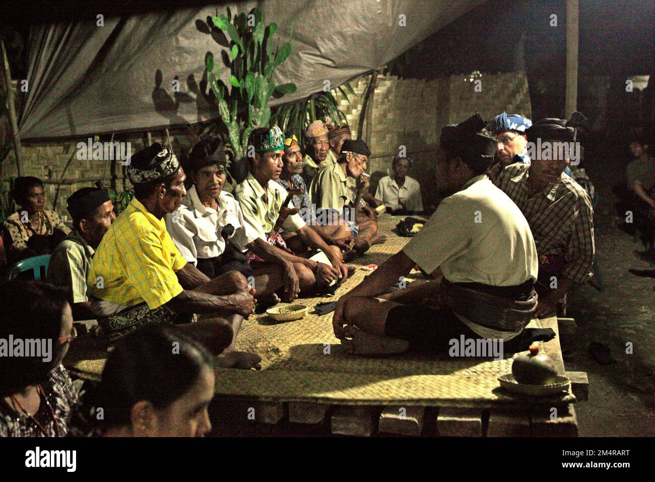 People dressed in Sumbanese traditional attire are photographed before ...