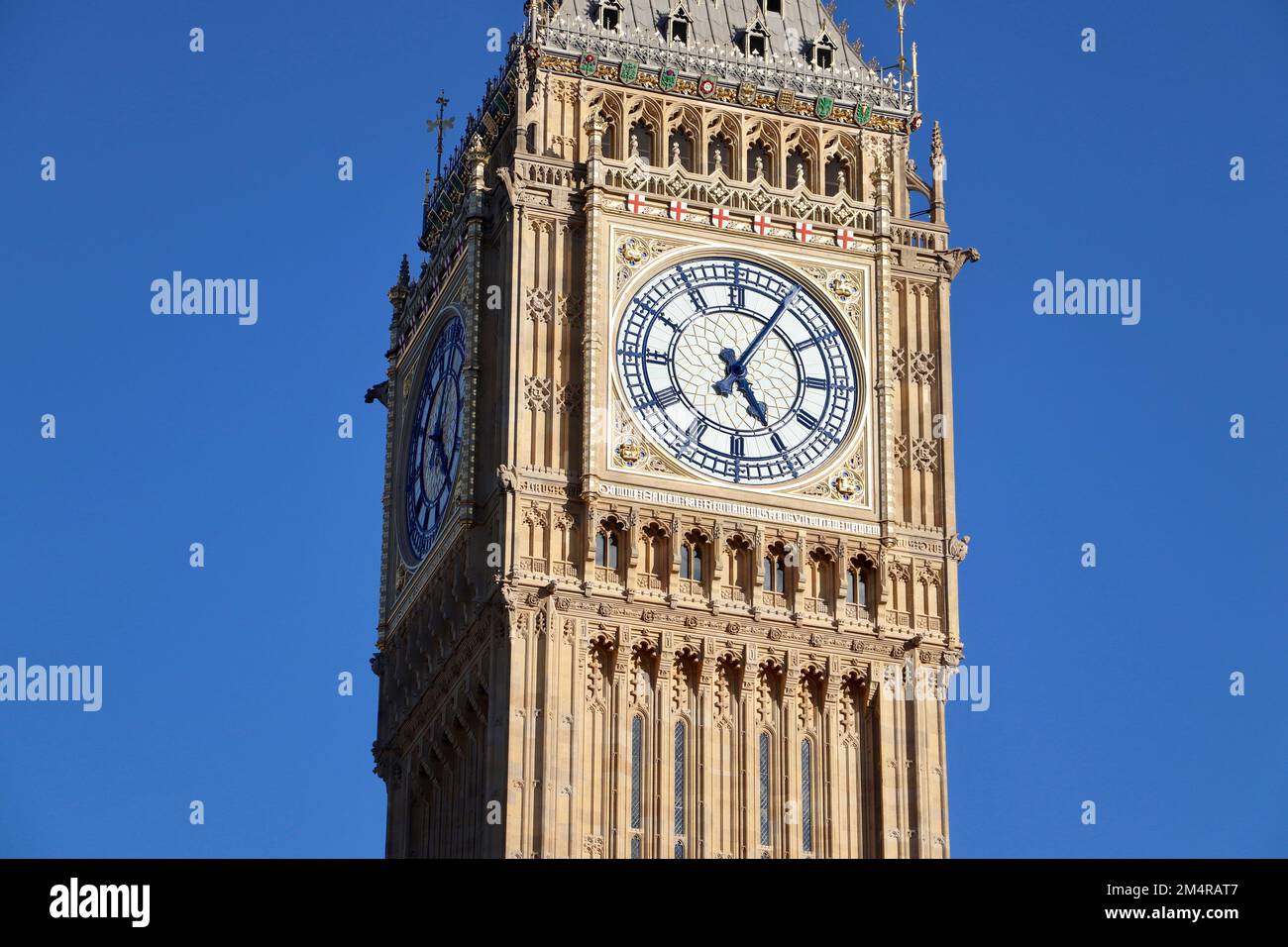 A scenic view of the Big Ben on blue sky background in London, England ...