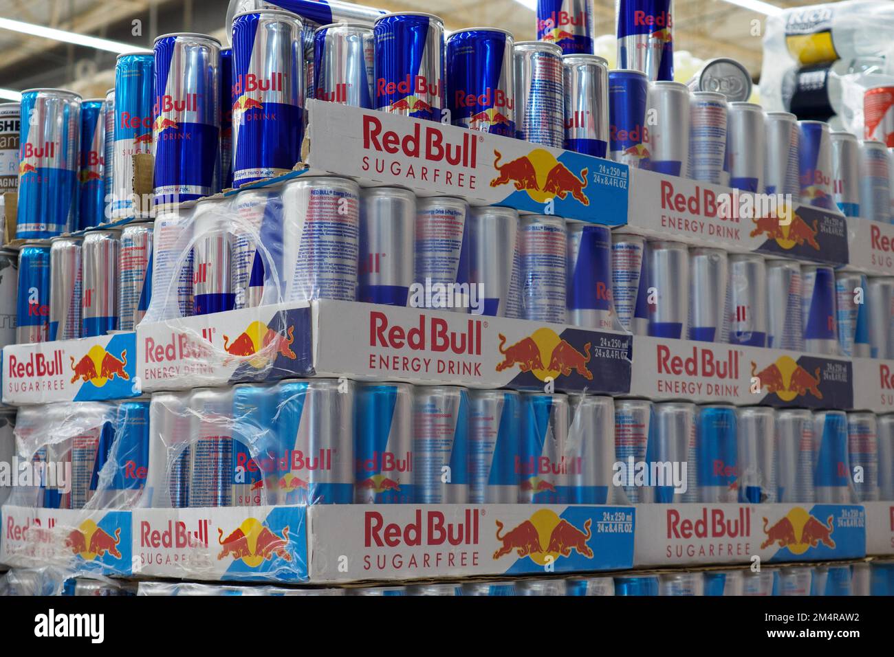 Cans of Red Bull energy drink seen at a store. (Photo by Alexander ...