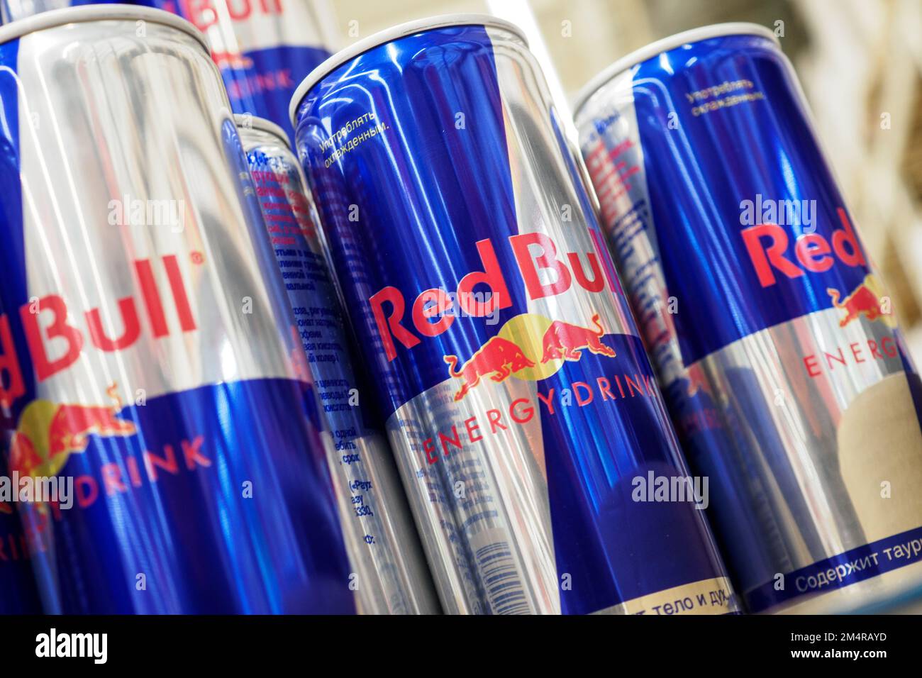 Cans of Red Bull energy drink seen at a store. (Photo by Alexander ...