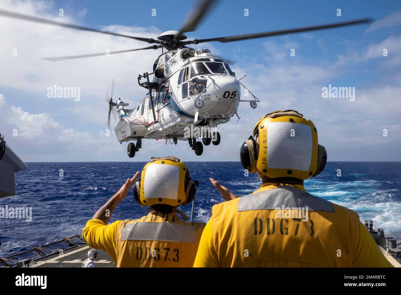 221221-N-SN516-1093 PACIFIC OCEAN (Dec. 21, 2022) U.S. Navy Sailors ...