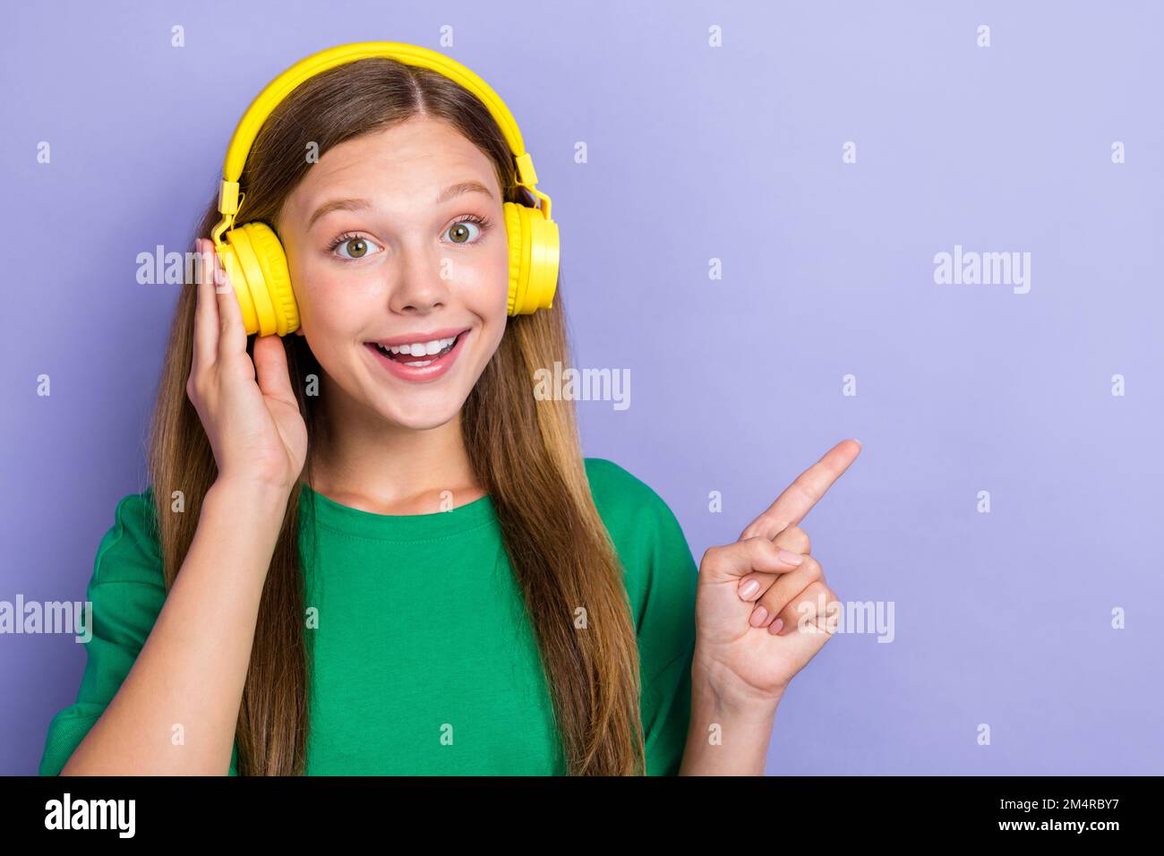 Photo of pretty positive cute girl arm direct empty space feedback ...