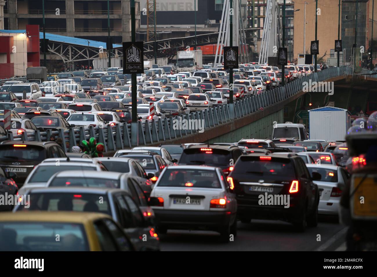 Tehran, Tehran, Iran. 20th Dec, 2022. In a traffic jam, vehicles ...